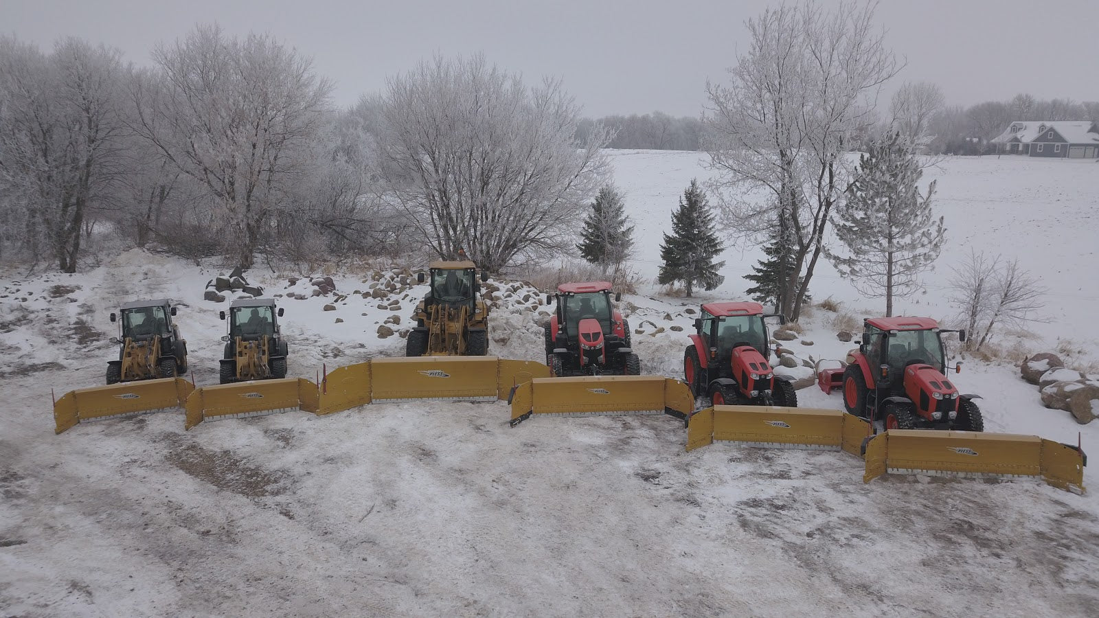 Tractors Vs. Loaders: A Four Year Study in Snow Removal – Voigt Smith ...